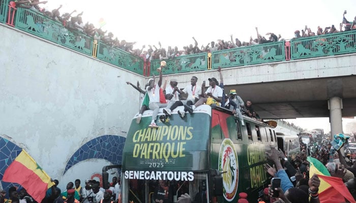 Senegal’s ‘historic’ AFCON champs honoured with parade, presidential praise