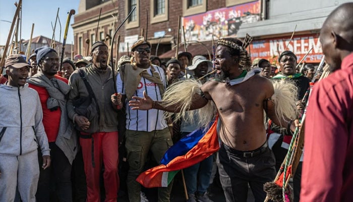S African anti-migrant protesters march after Ramaphosa warns vigilantes