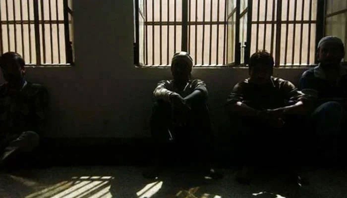 Cop, civilian arrested after viral video from police station
