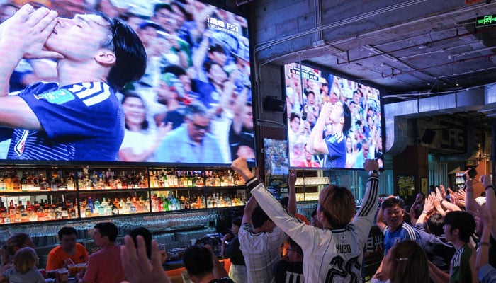 Japan stroll to victory over Tunisia in World Cup's 1,000th game